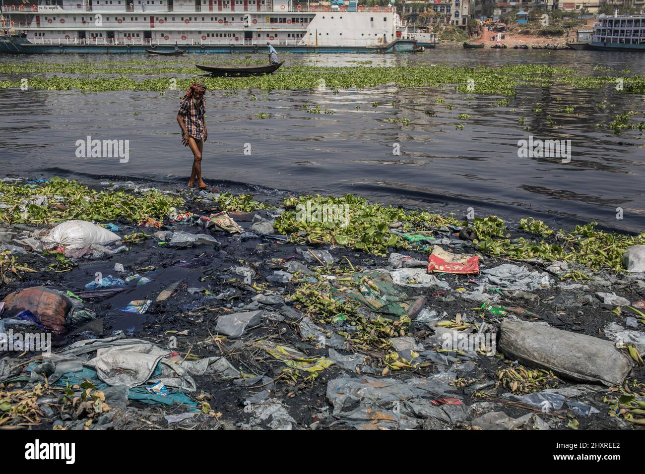 A view of a polluted Buringaga River. The water in the Buringaga River ...