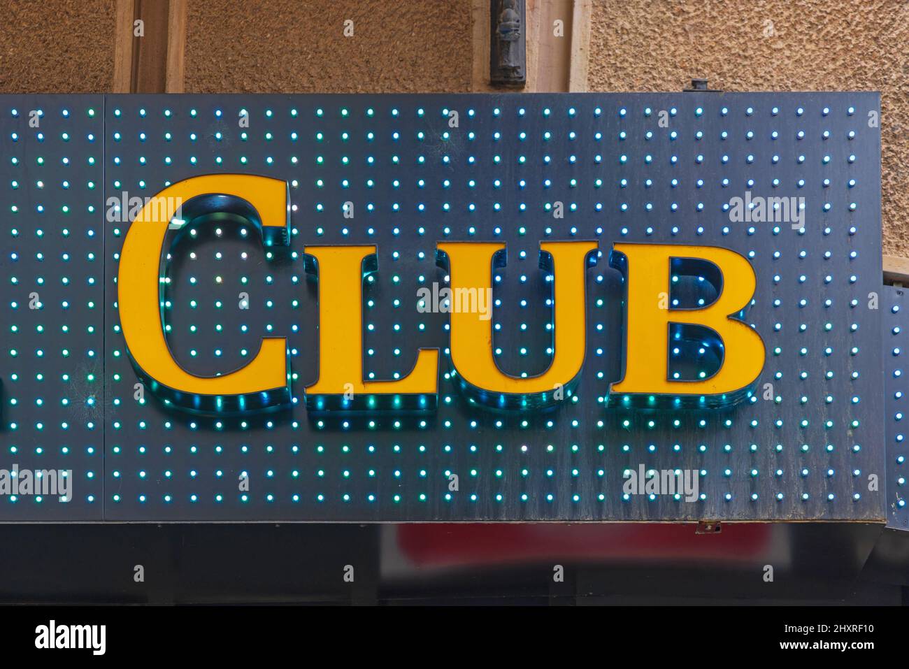 Yellow Sign Club at Led Lights Background Stock Photo - Alamy