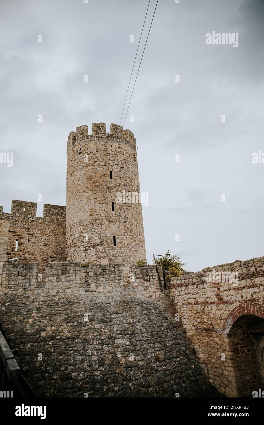 Vertical shot of the ancient Belgrade Fortress with white stone walls ...