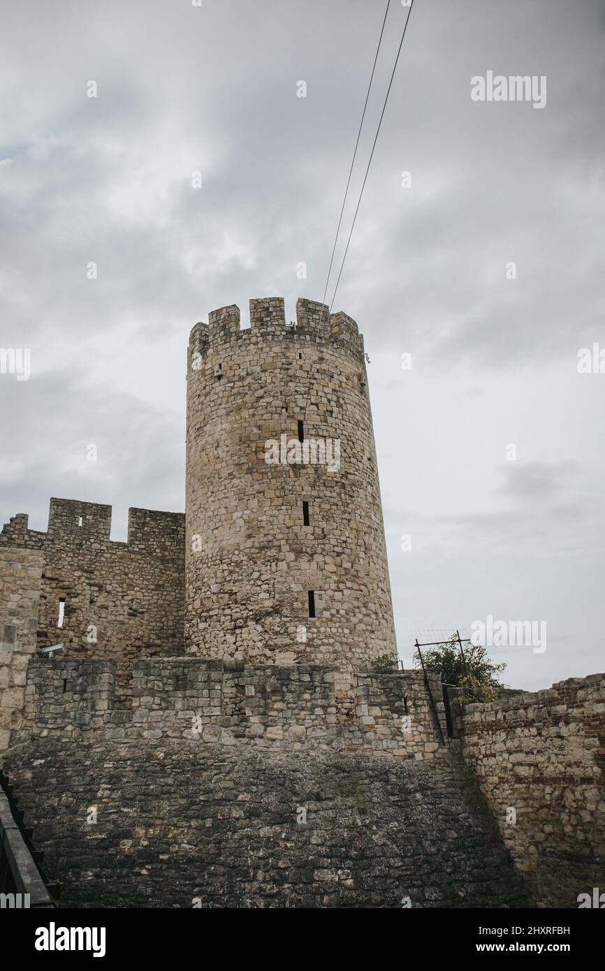Vertical shot of the ancient Belgrade Fortress with white stone walls ...