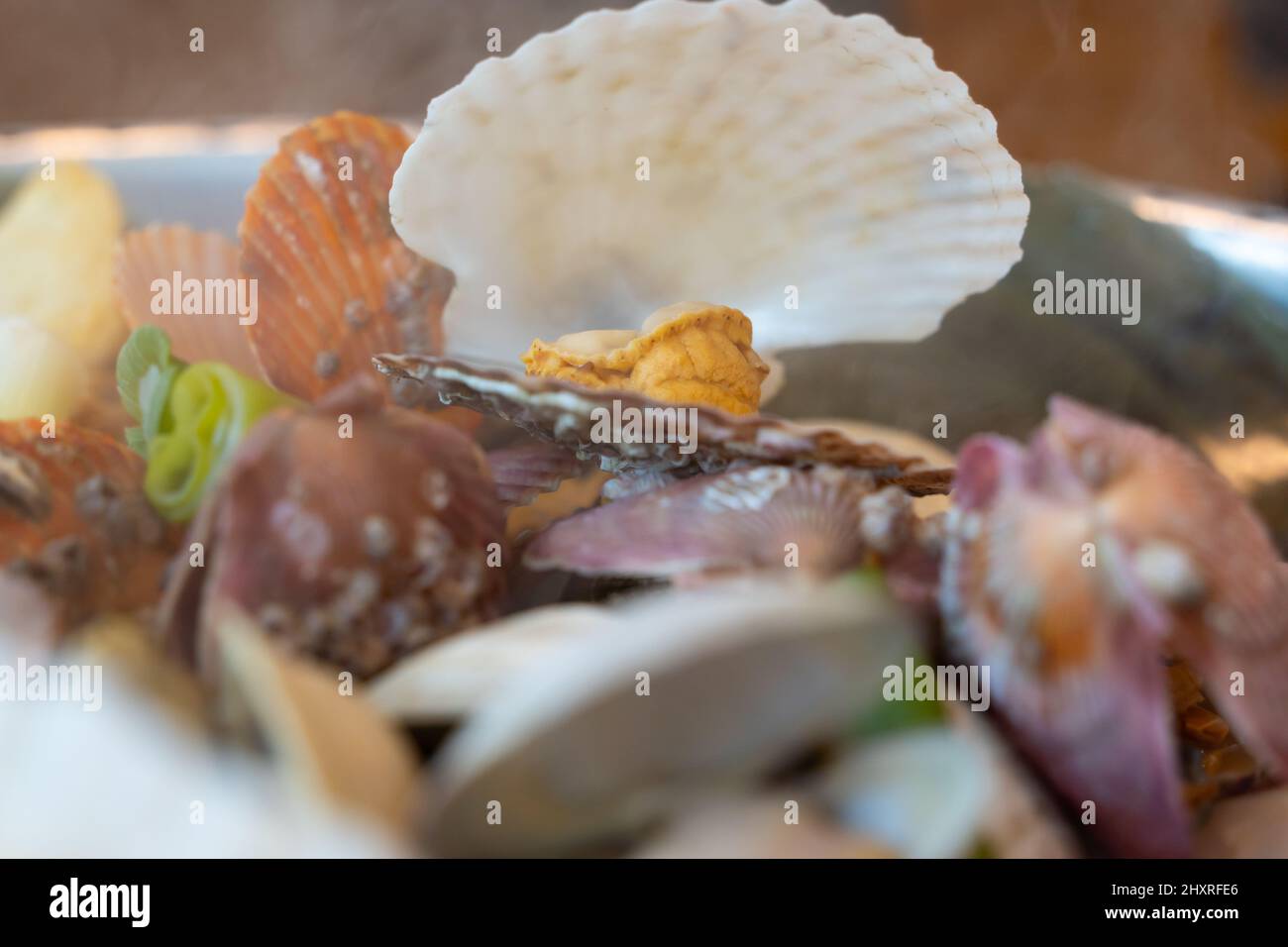 Steamed clams are various kinds of shellfish mixed with seafood, such ...
