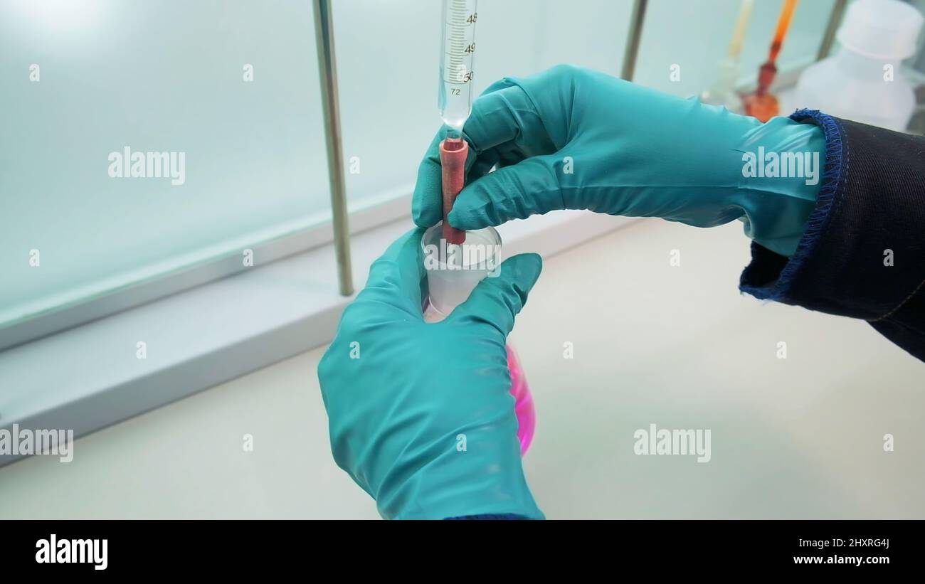 Analysis in the laboratory. Clip. Chemical testing through mixing Stock ...
