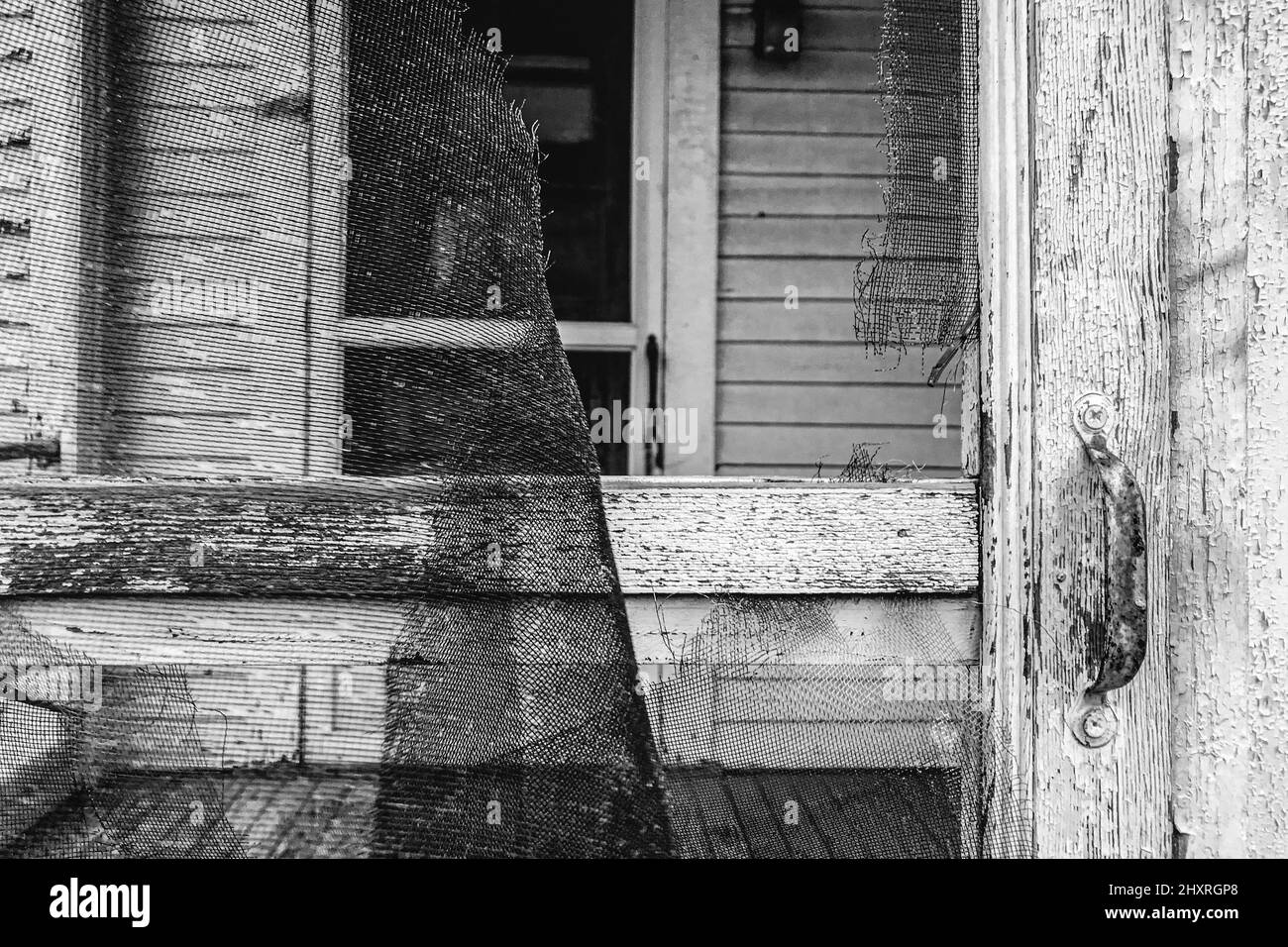 Behind door Black and White Stock Photos & Images - Alamy