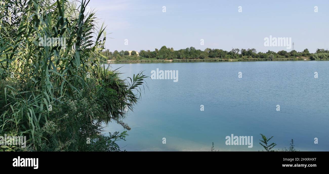 Of big field and a river Stock Photo - Alamy