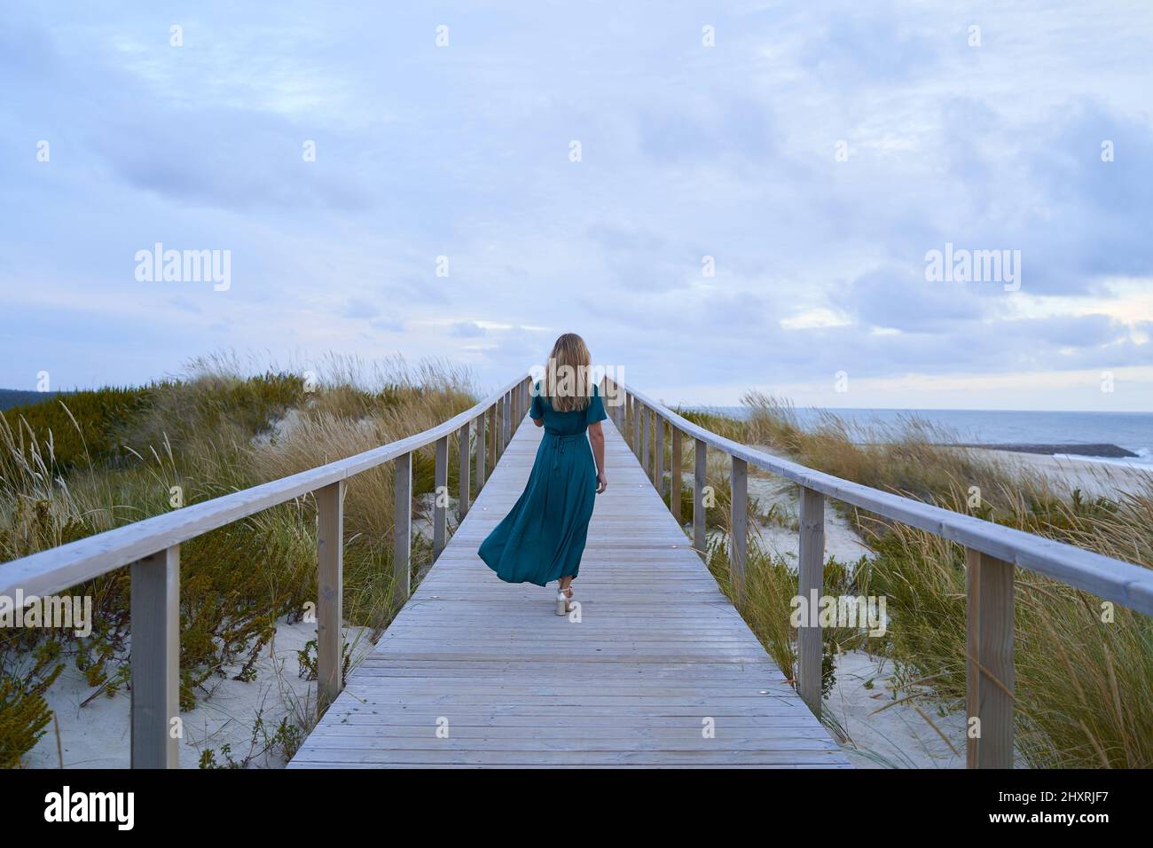 Woman walk back elegant hi-res stock photography and images - Alamy