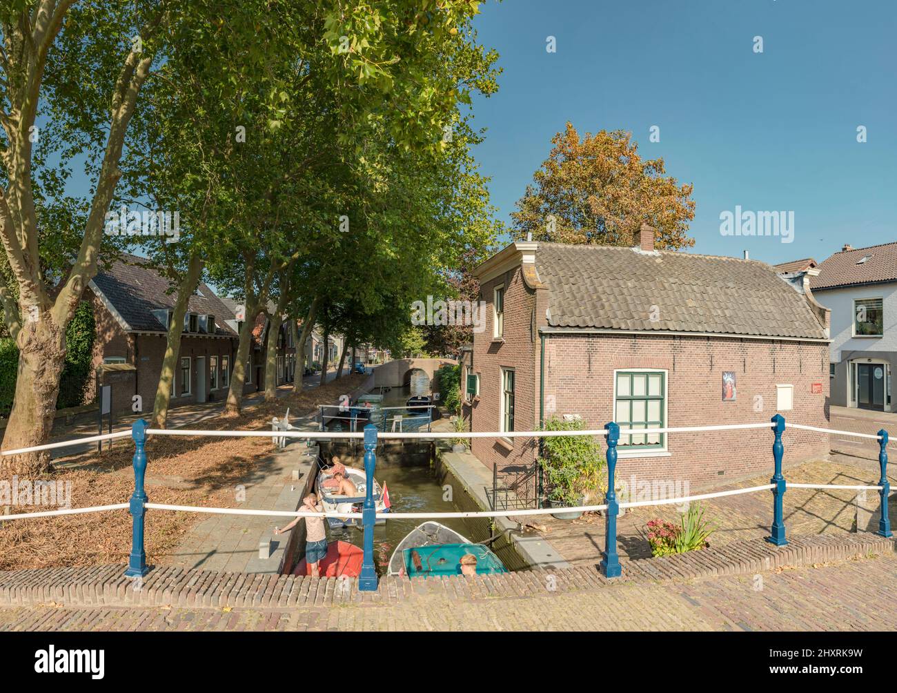 Boating in the locks of a canal, Oudewater, Utrecht, Netherlands ...