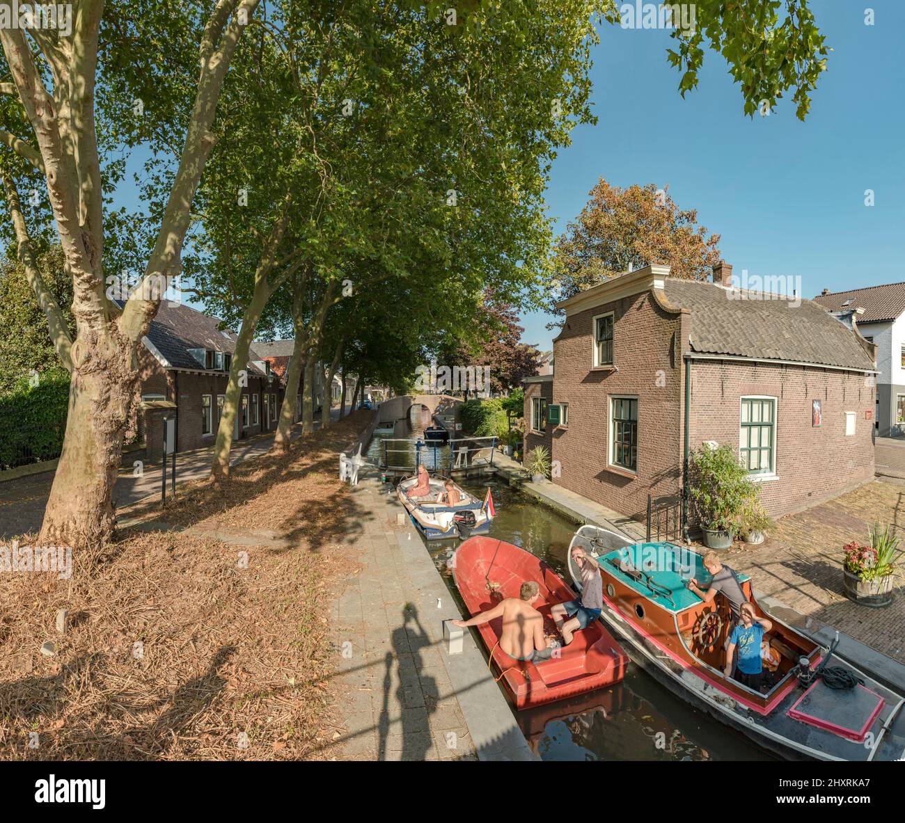 Boating in the locks of a canal, Oudewater, Utrecht, Netherlands ...