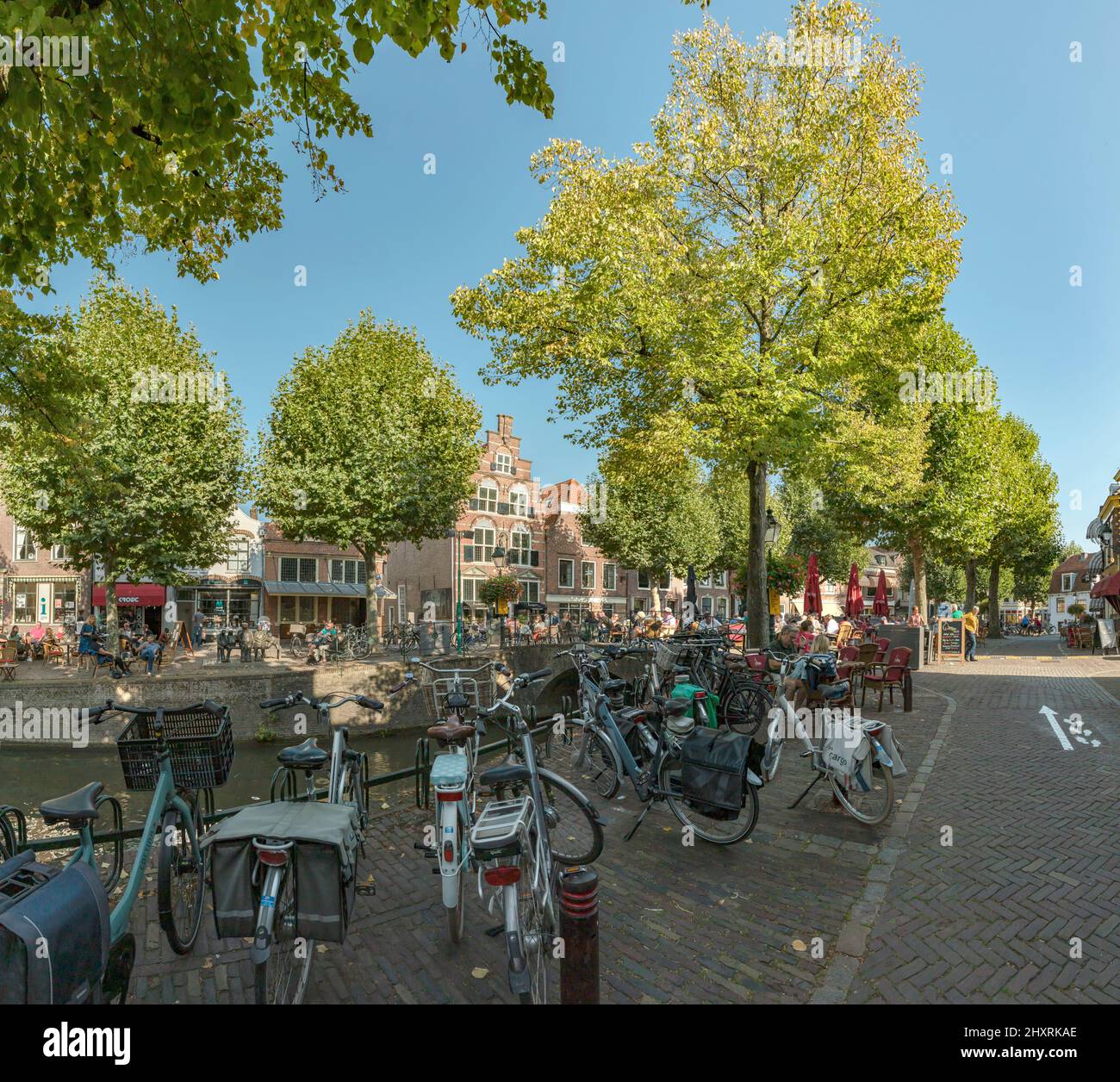 Outdoor cafe at the Old Market, step-gabled houses, Oudewater, Utrecht ...