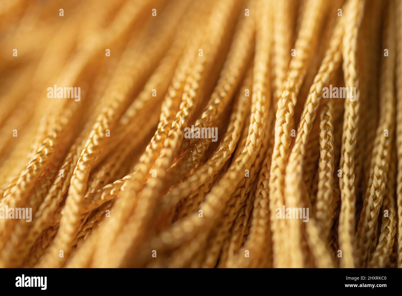 Yellow gold cords with texture Stock Photo - Alamy