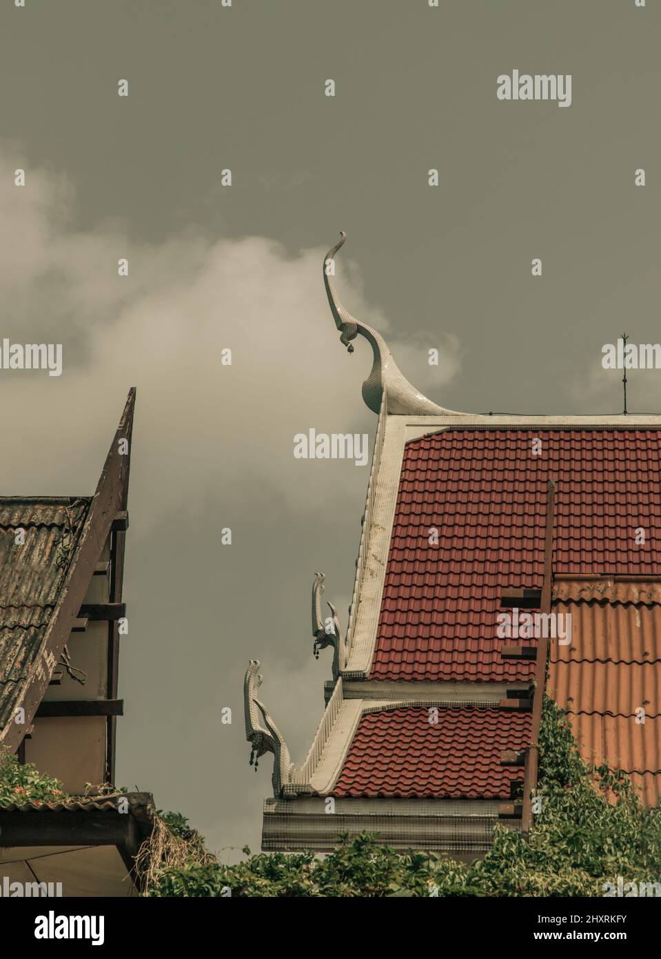 Gable apex on the Buddhist temple roof with sky background. gable apex ...