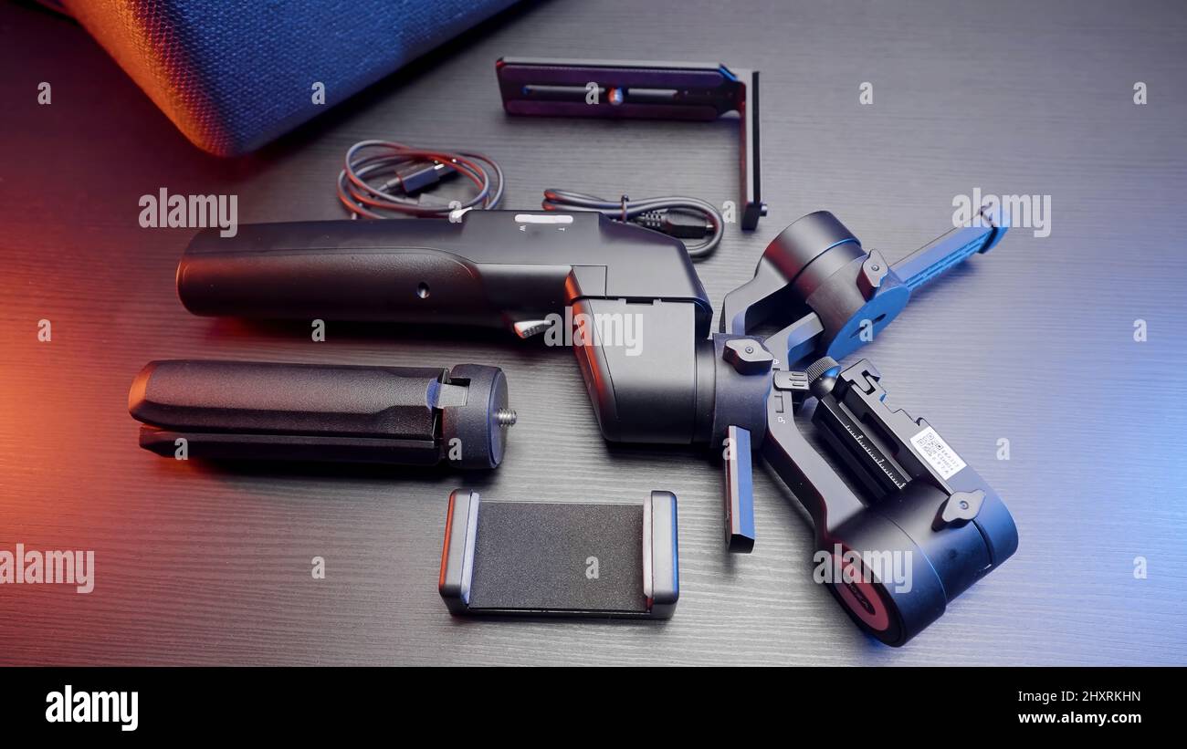 Close up of new smartphone stabilizer. Action. New professional ...