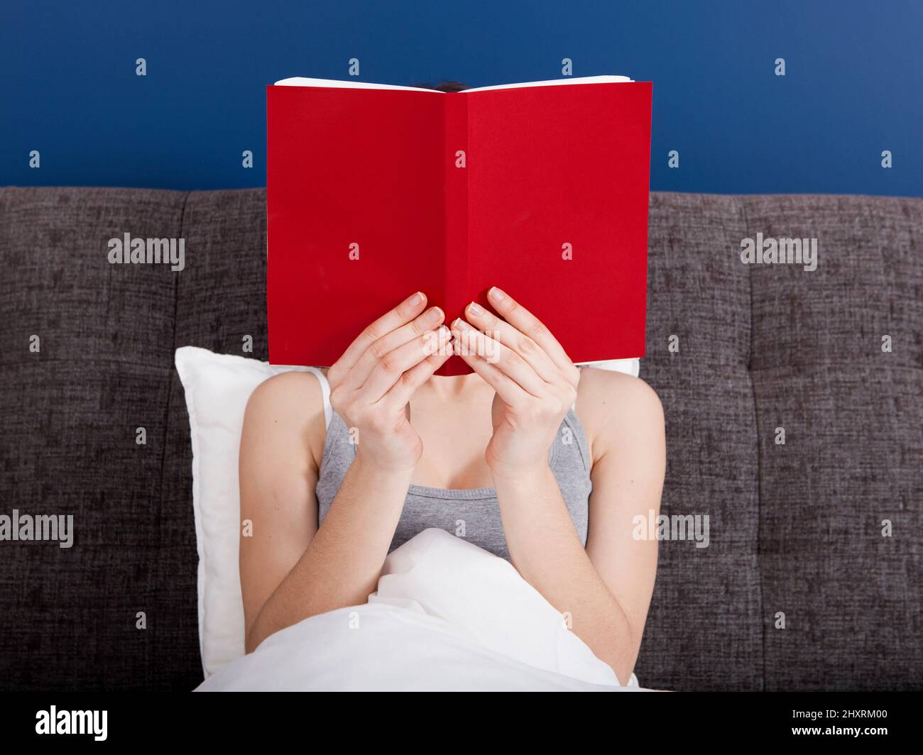Its time to read my red book Stock Photo - Alamy