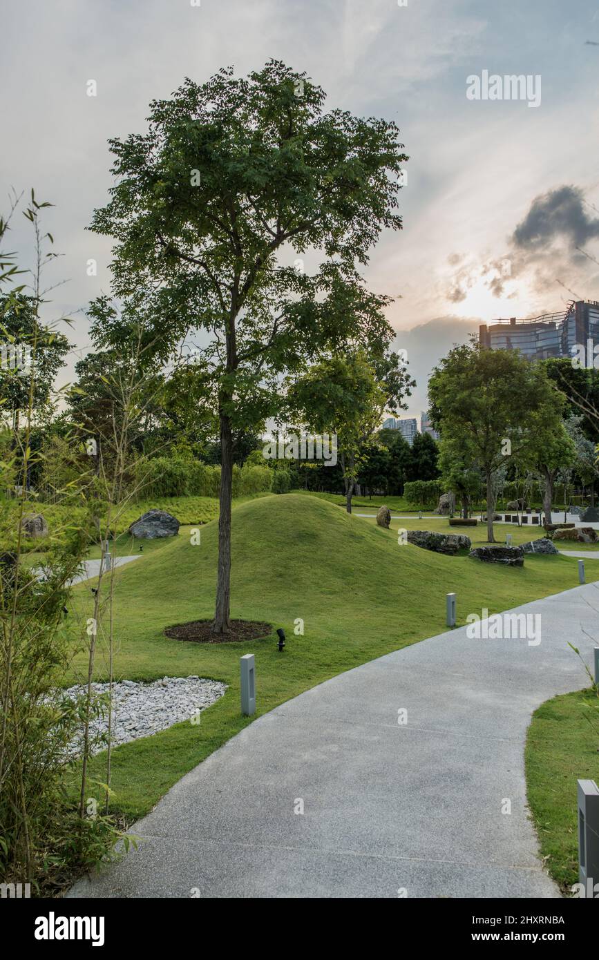 Landscape, public park with mowed lawn, walking path Stock Photo - Alamy