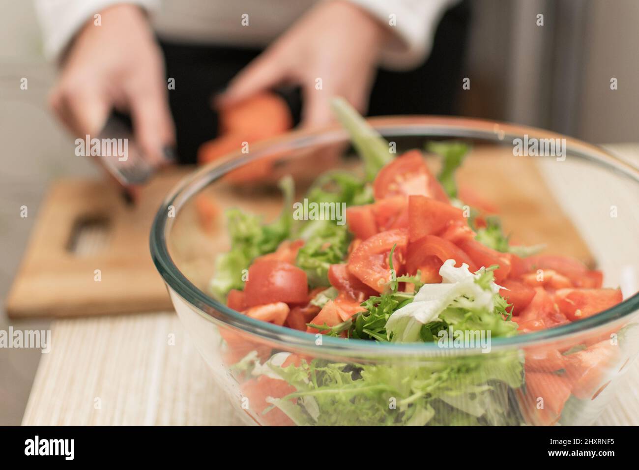 Preparation salad from tomato hi-res stock photography and images - Alamy
