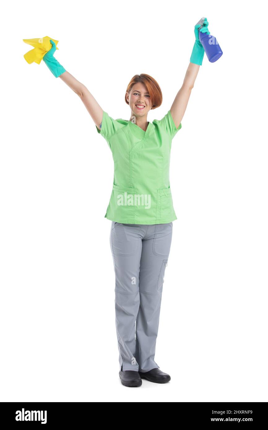 Full length portrait of professional cleaner woman with cleaning spray ...