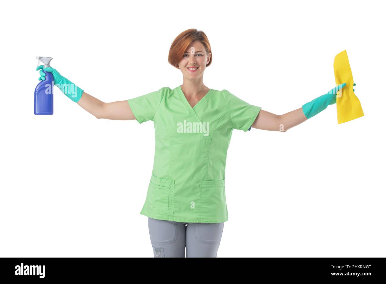 Full length portrait of professional cleaner woman with cleaning spray ...