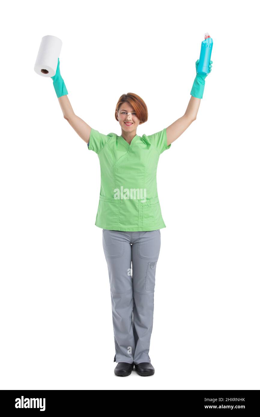 Full length portrait of professional cleaner woman with cleaning spray ...