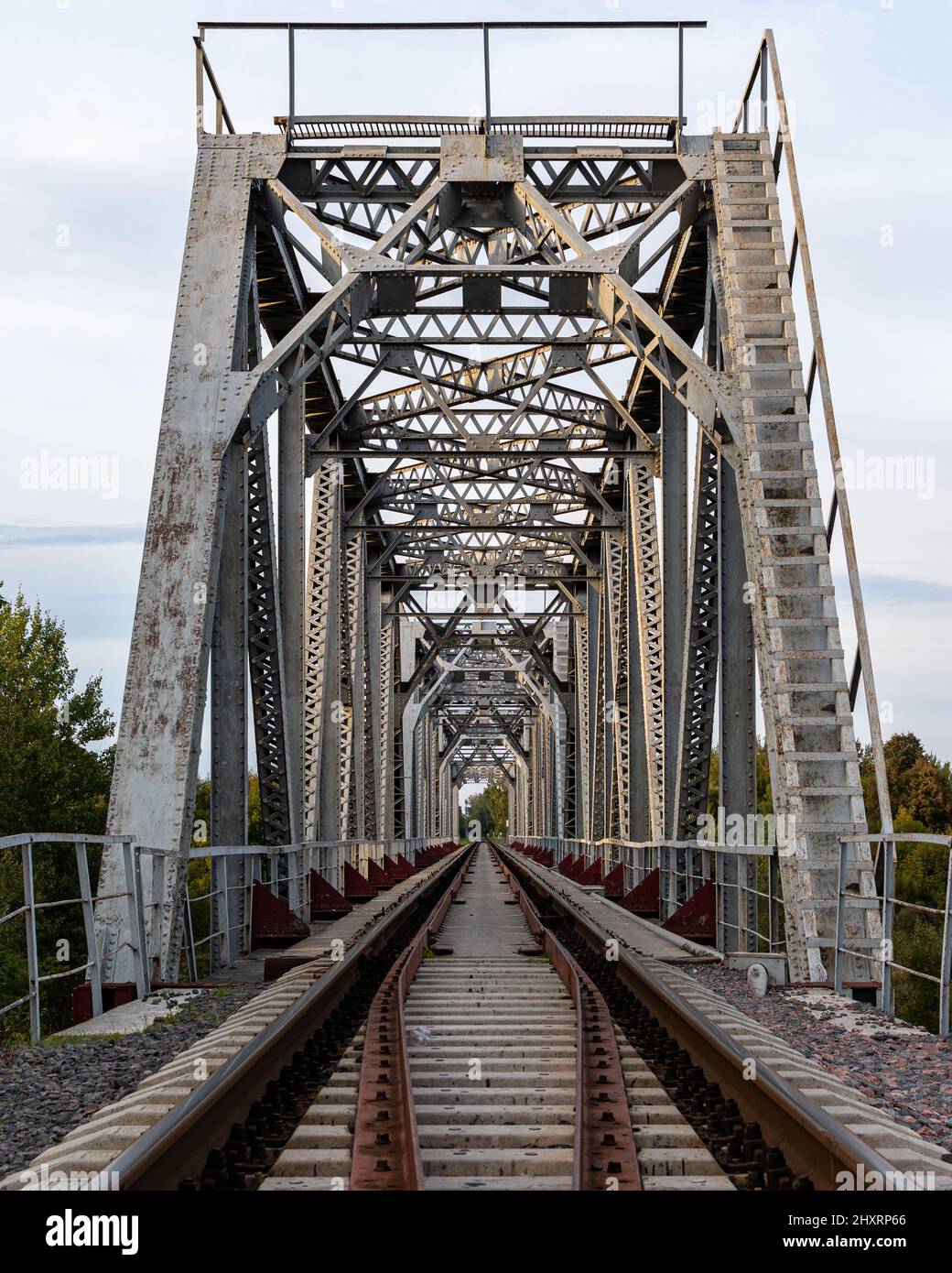 Vertical vanishing point shot of a railroad bridge in Gomel, Belarus ...