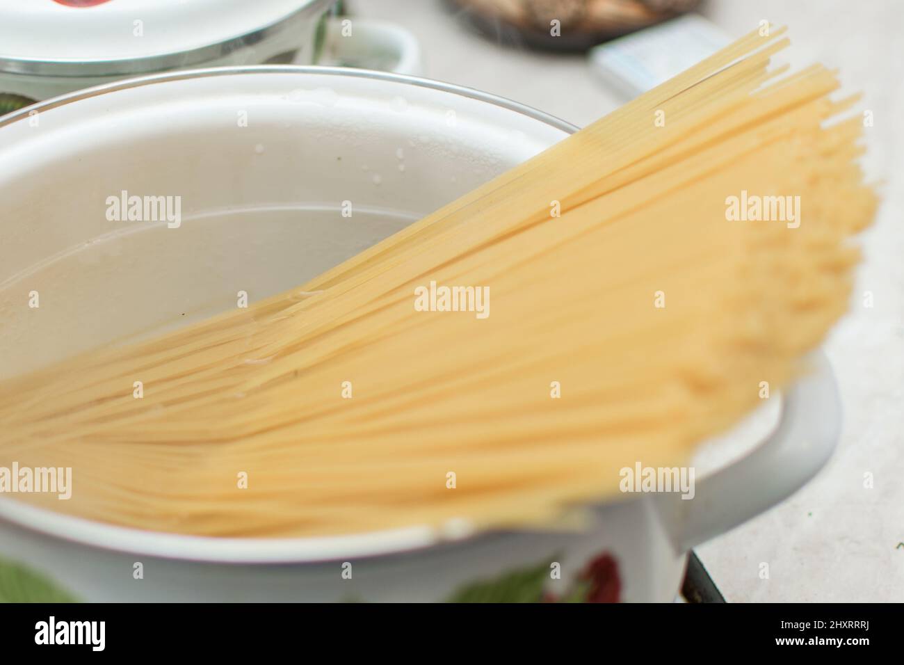 Spaghetti boiling in a saucepan Stock Photo - Alamy