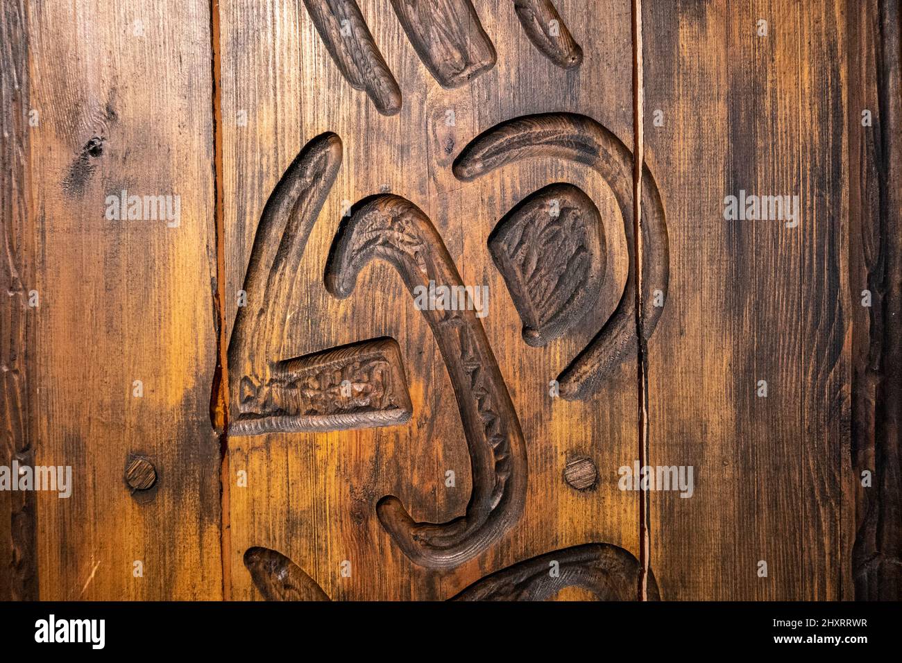 Closeup of wood carvings with special symbols Stock Photo - Alamy