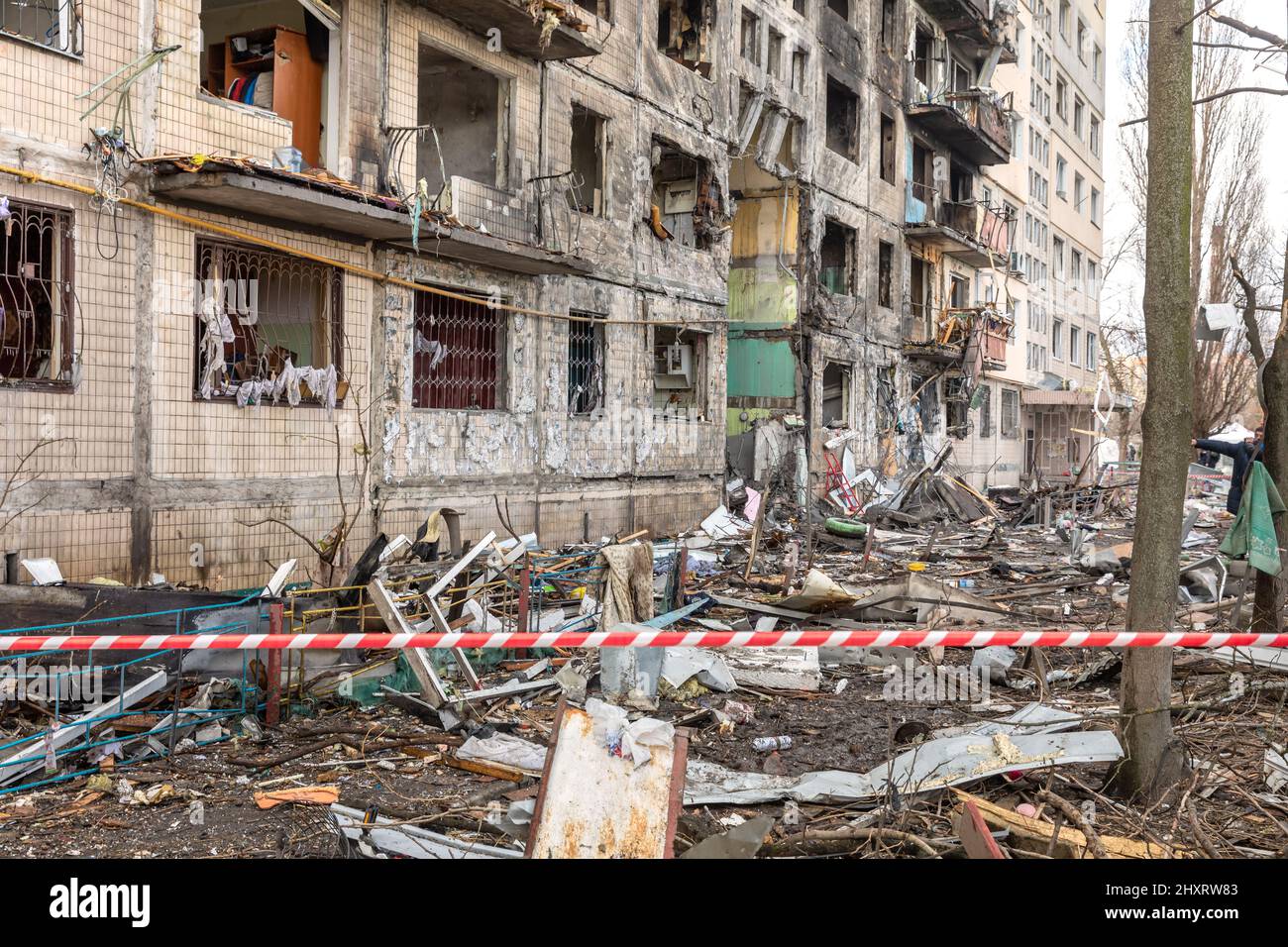 General view of a badly damaged residential building that was hit by a ...