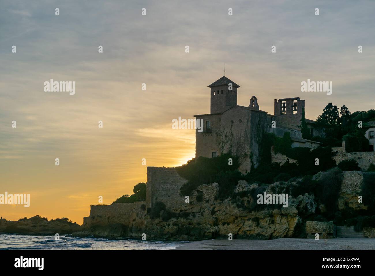 Sunset behind de Tamarit castle, Altafulla, Tarragona Stock Photo - Alamy