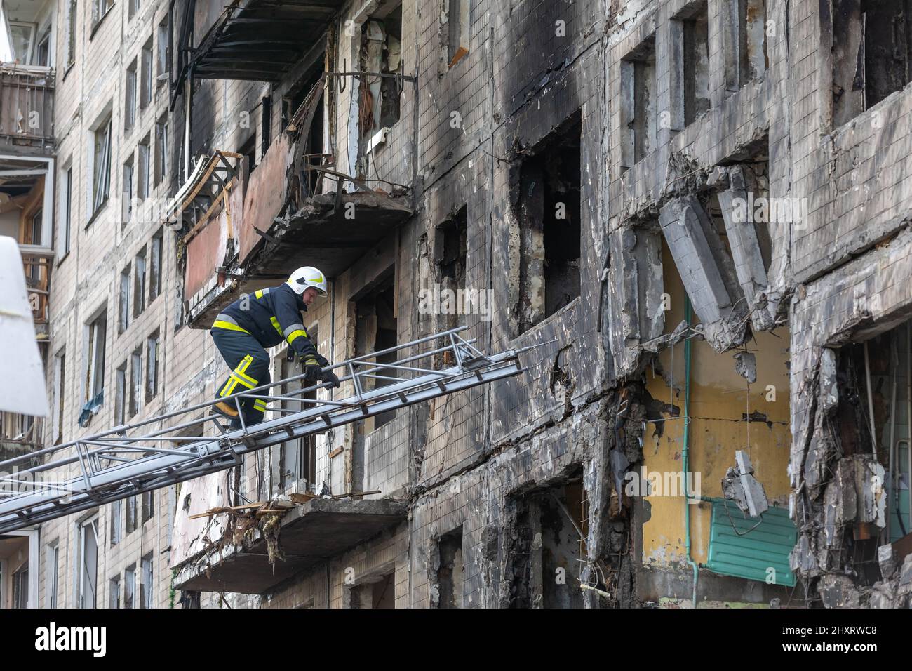 Badly damaged residential building that was hit by a Russian shell.A ...
