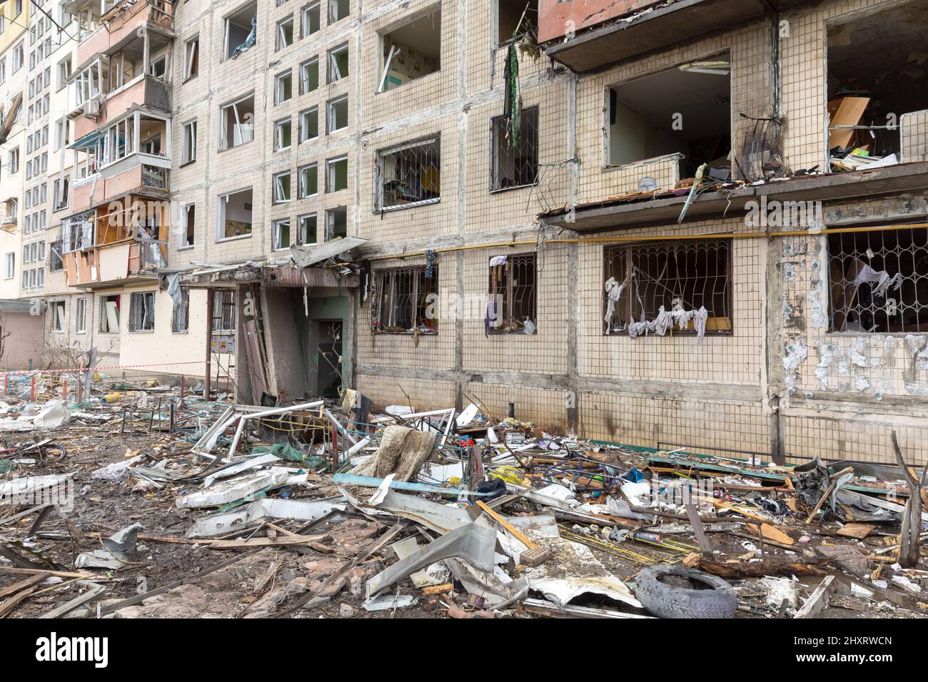 General view of a badly damaged residential building that was hit by a ...