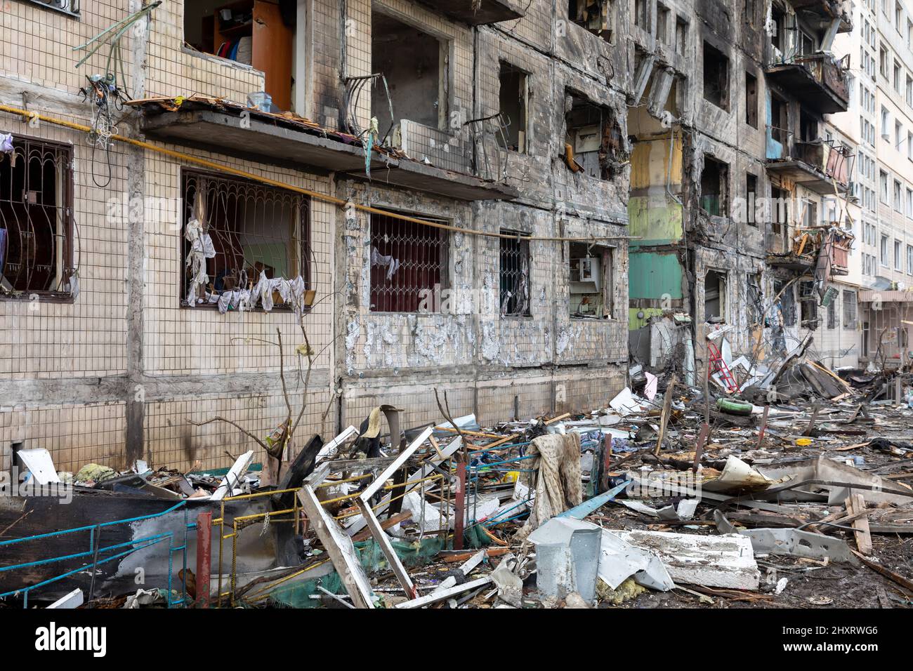 General view of a badly damaged residential building that was hit by a ...