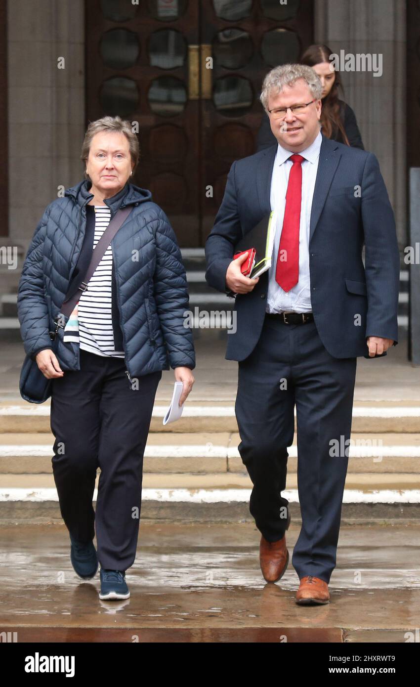 Cathy Gardner (left) and Paul Conrathe leave the High Court, London ...
