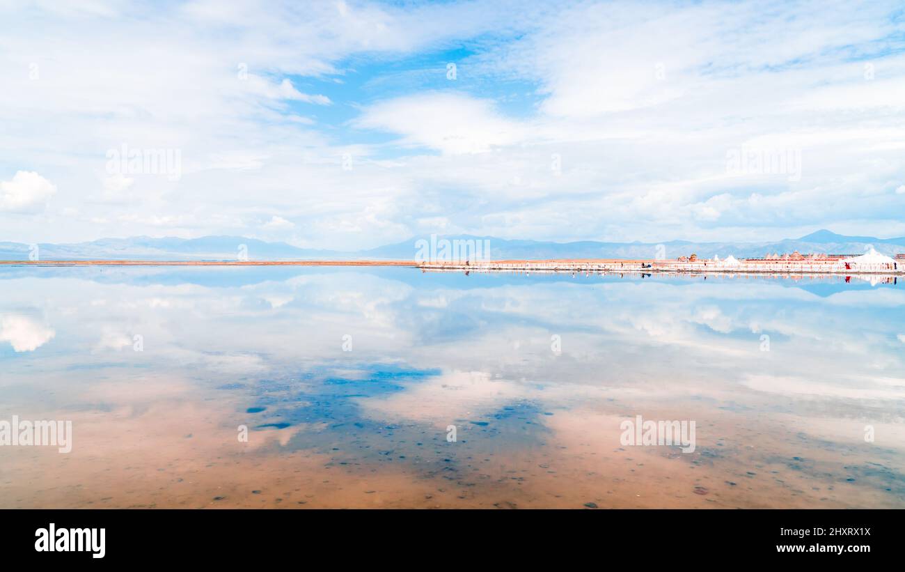 Reflections of the clouds in the clear water of the sea Stock Photo - Alamy