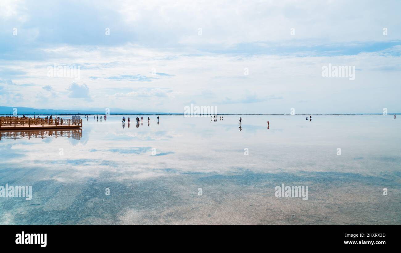Reflections of the clouds in the clear water of the sea Stock Photo - Alamy