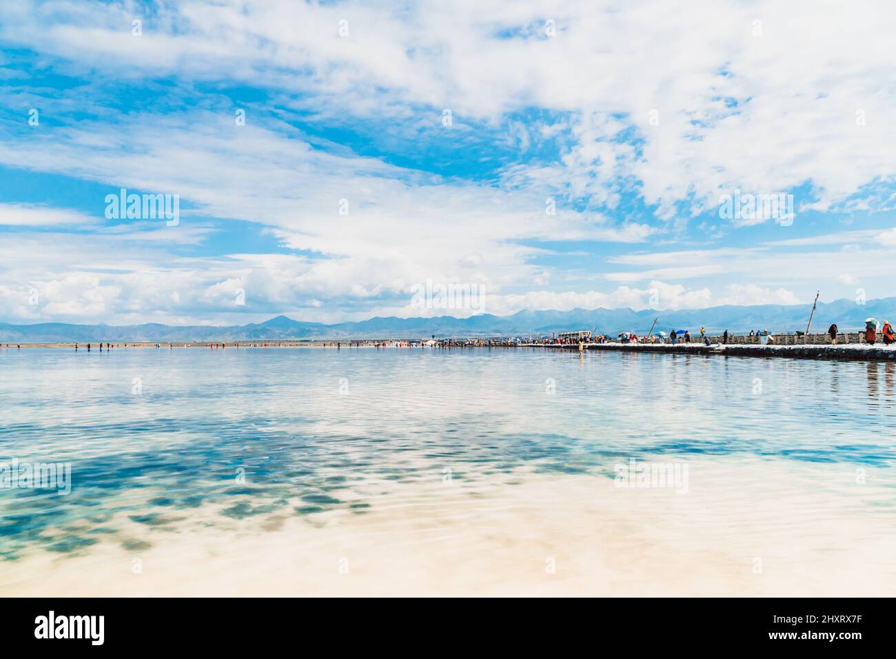 Reflections of the clouds in the clear water of the sea Stock Photo - Alamy