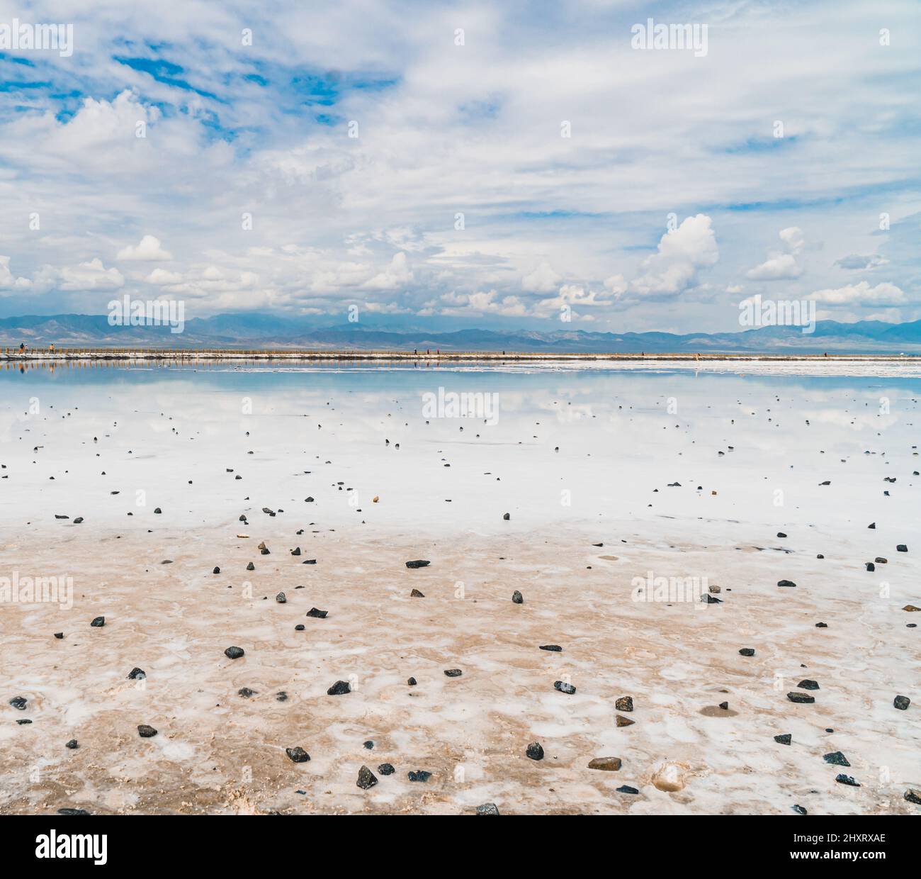 Reflections of the clouds in the clear water of the sea Stock Photo - Alamy