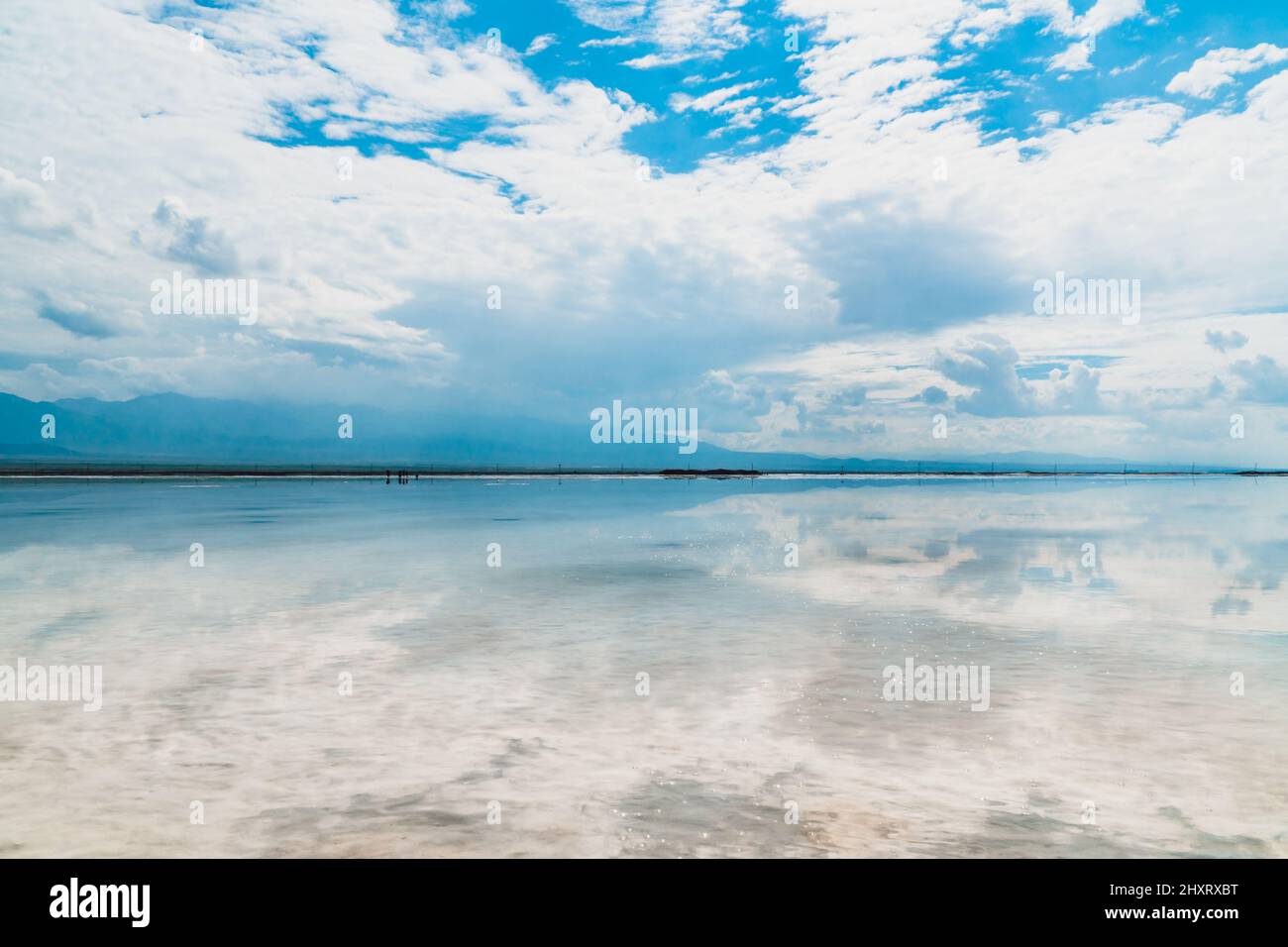 Reflections of the clouds in the clear water of the sea Stock Photo - Alamy