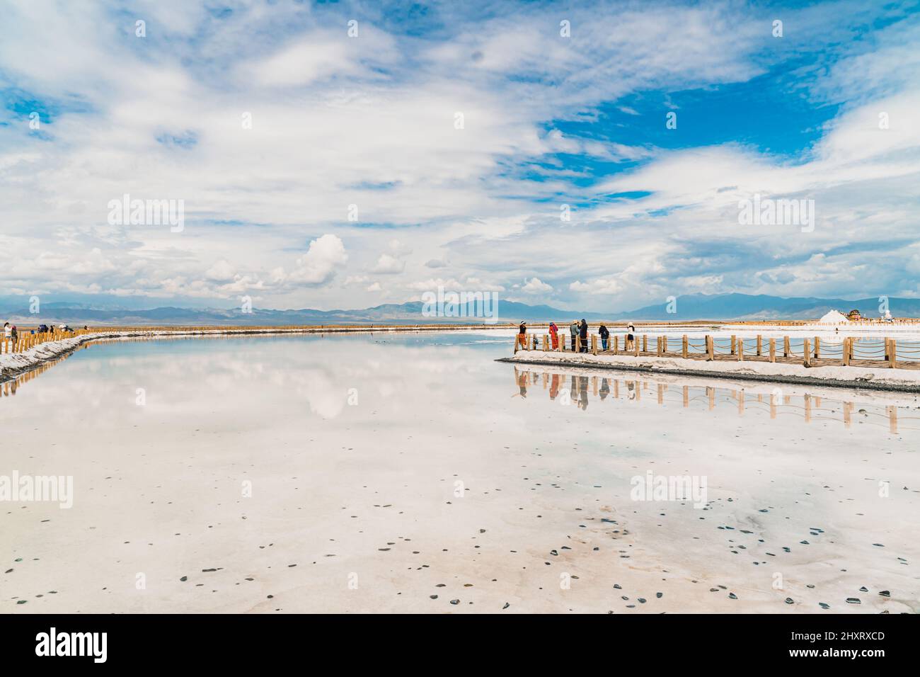 The reflections of the clouds in the clear water of the sea Stock Photo ...