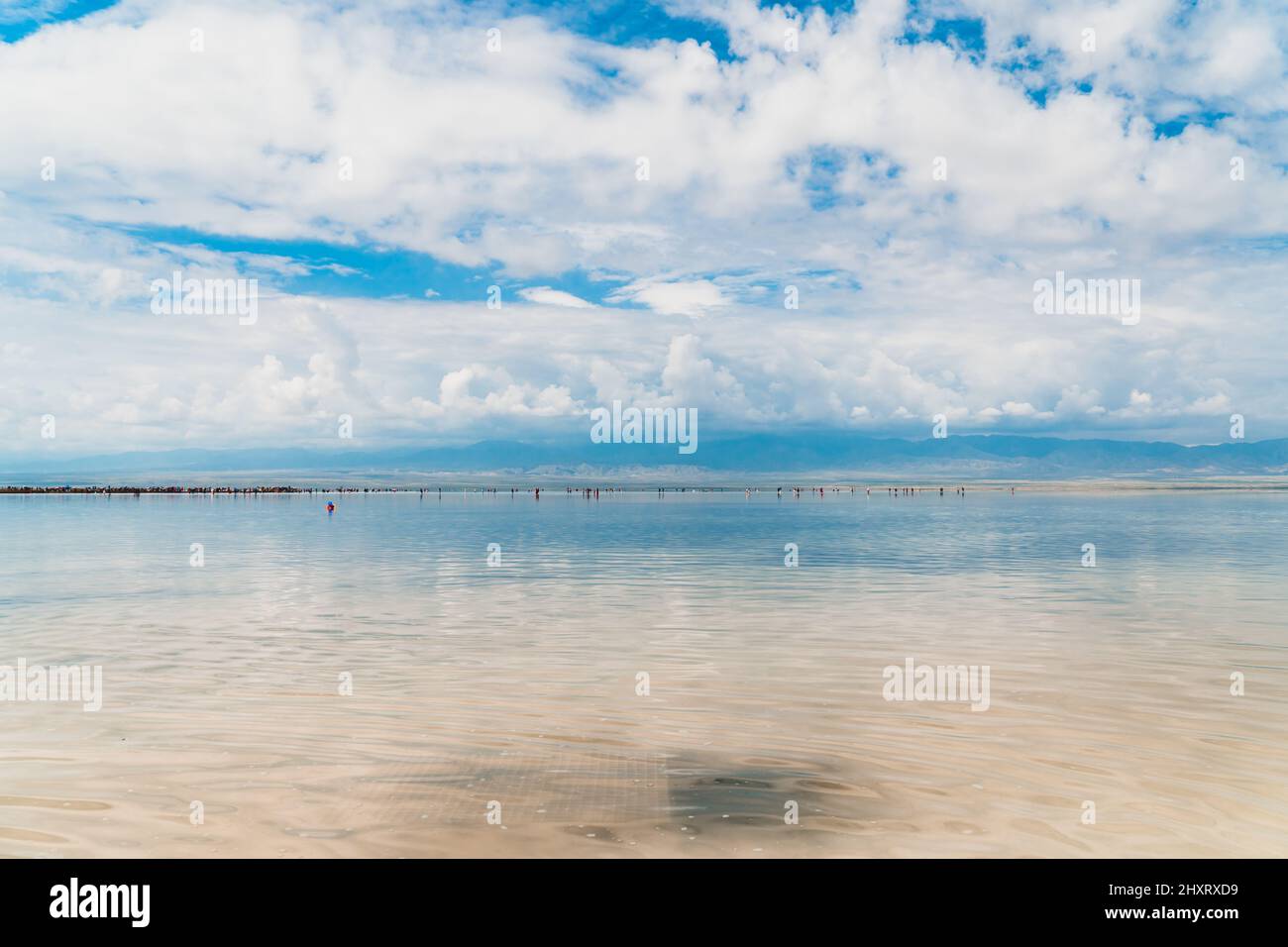 Reflections of the clouds in the clear water of the sea Stock Photo - Alamy