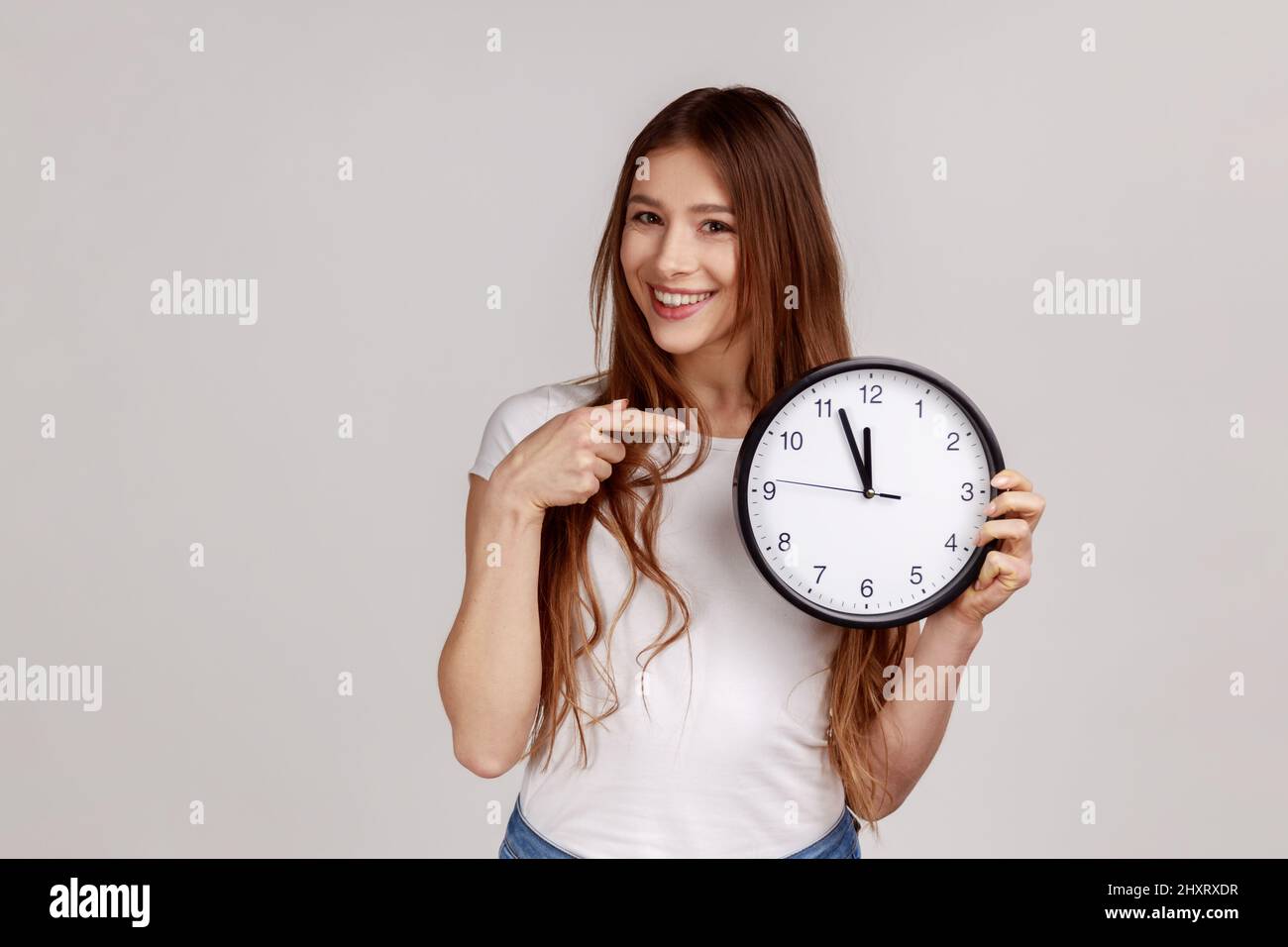 Hand pointing to time hi-res stock photography and images - Alamy
