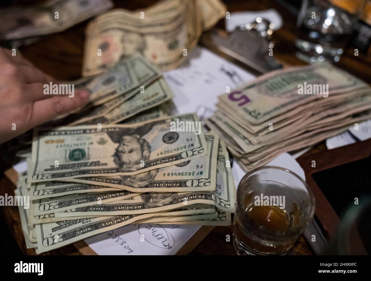 UNITED STATES - MARCH 13: Money is counted during the St. Baldrick's ...