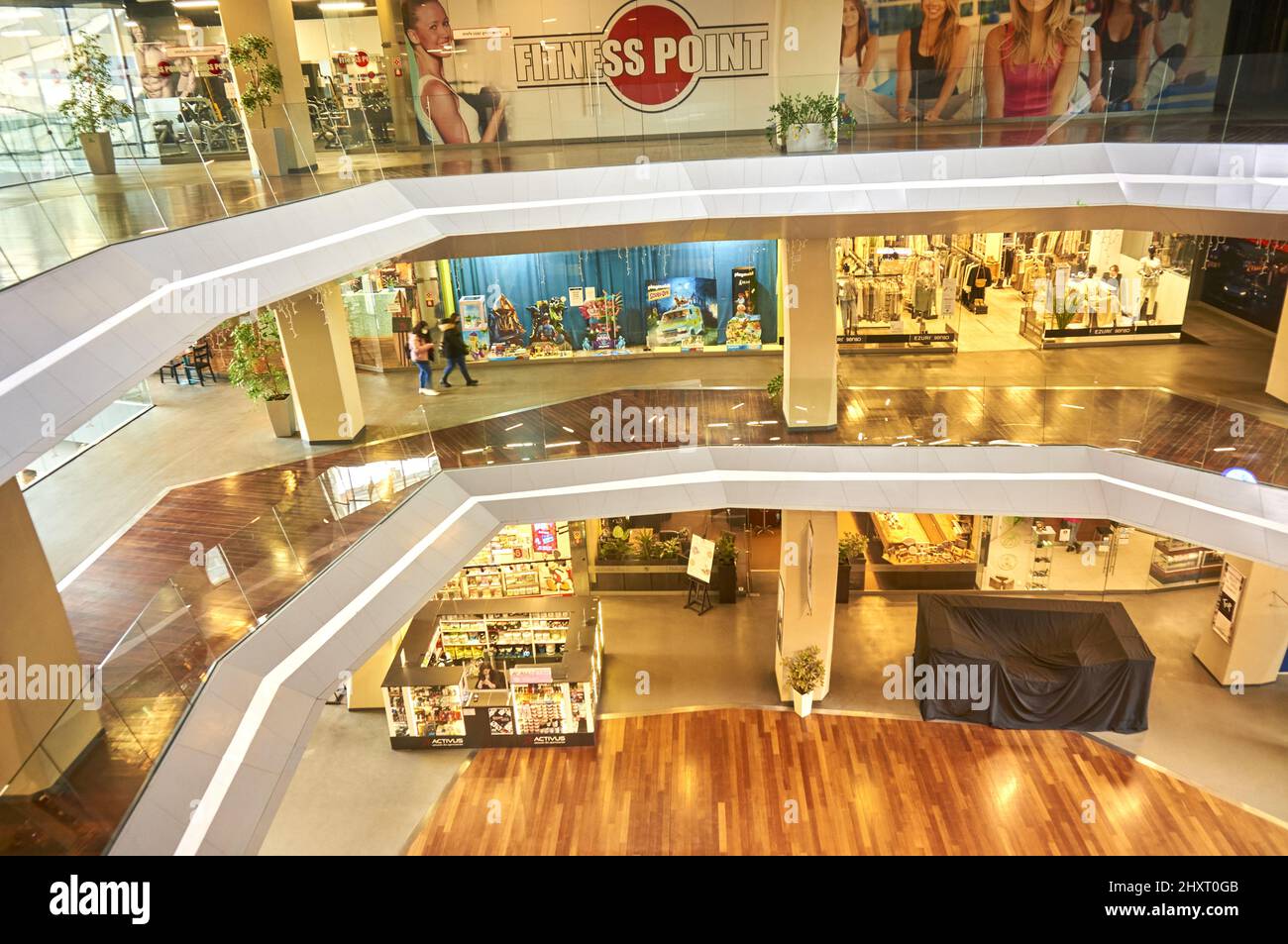 Interior with small shops of the Galeria MM shopping mall in the city ...