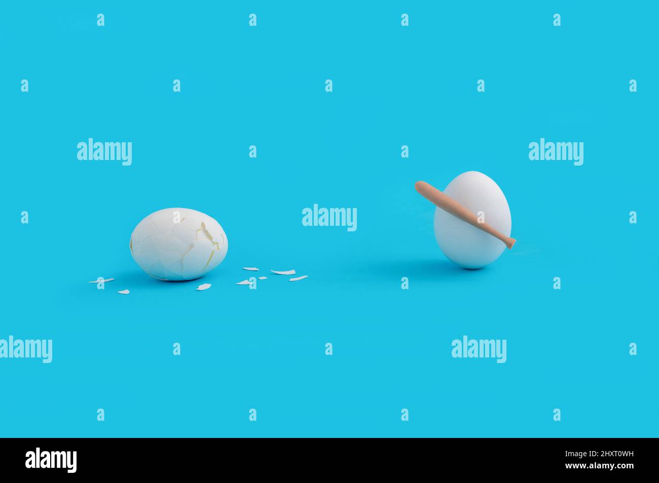 Illustration of two Easter eggs one with a wooden bat and the other ...
