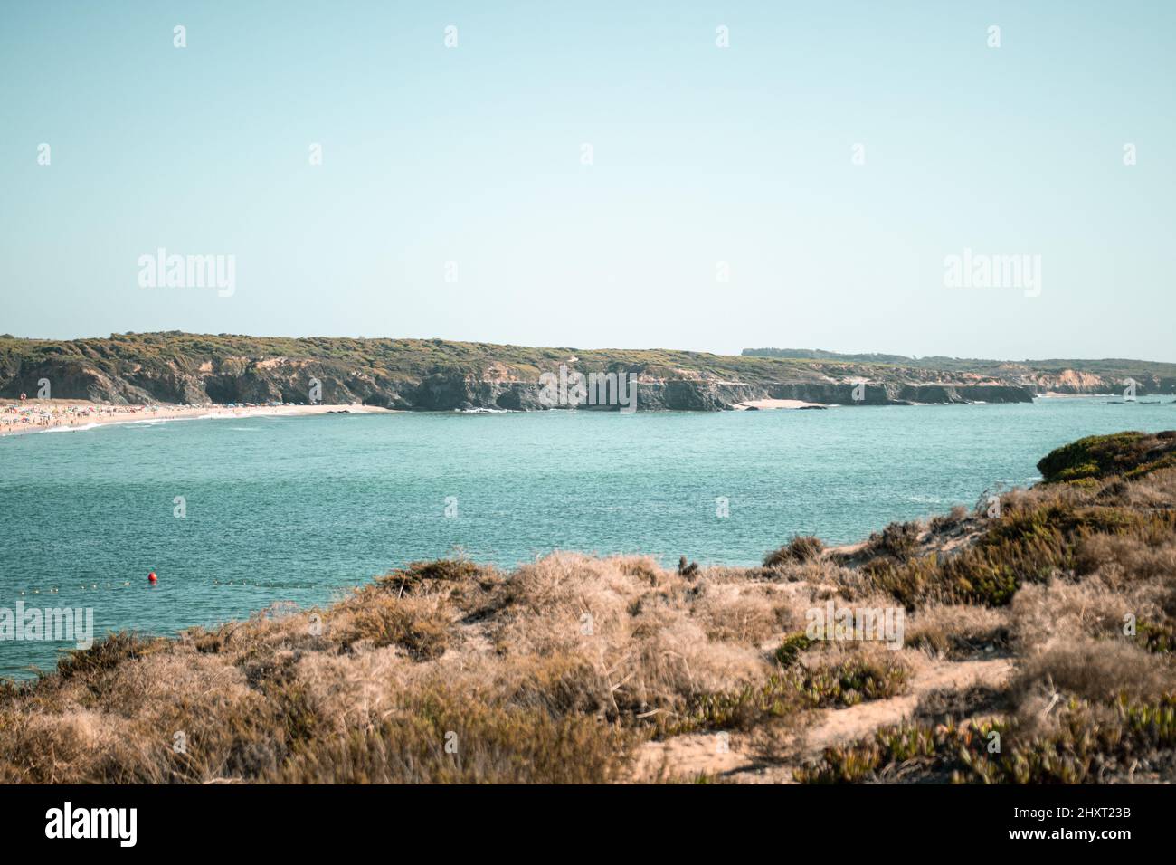 Beautiful landscape of water and hills against blue sky in Costa ...
