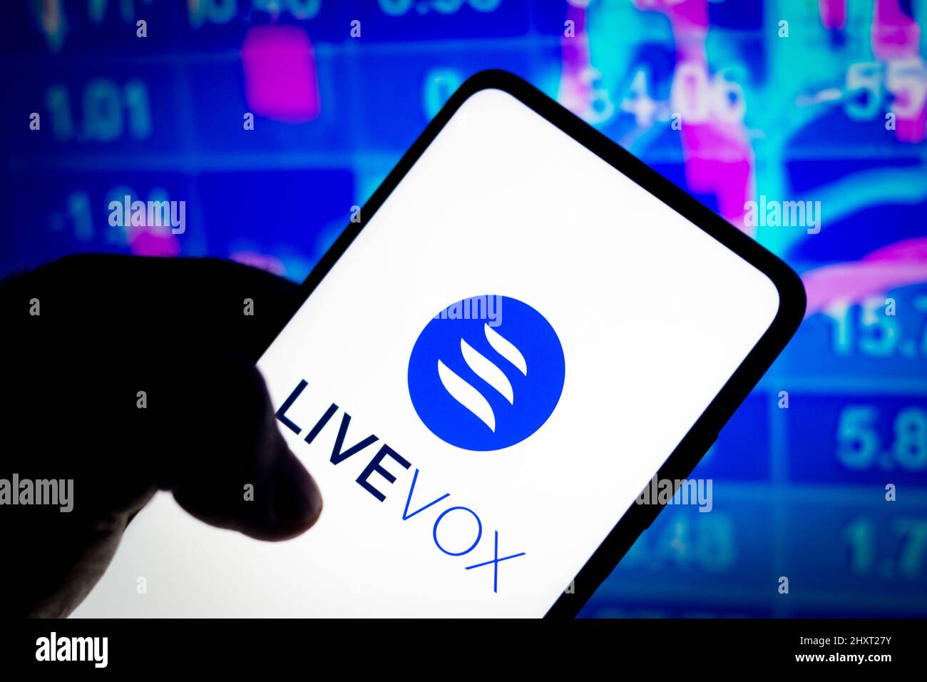 In this photo illustration, the LiveVox Holding logo is displayed on a smartphone screen Stock ...