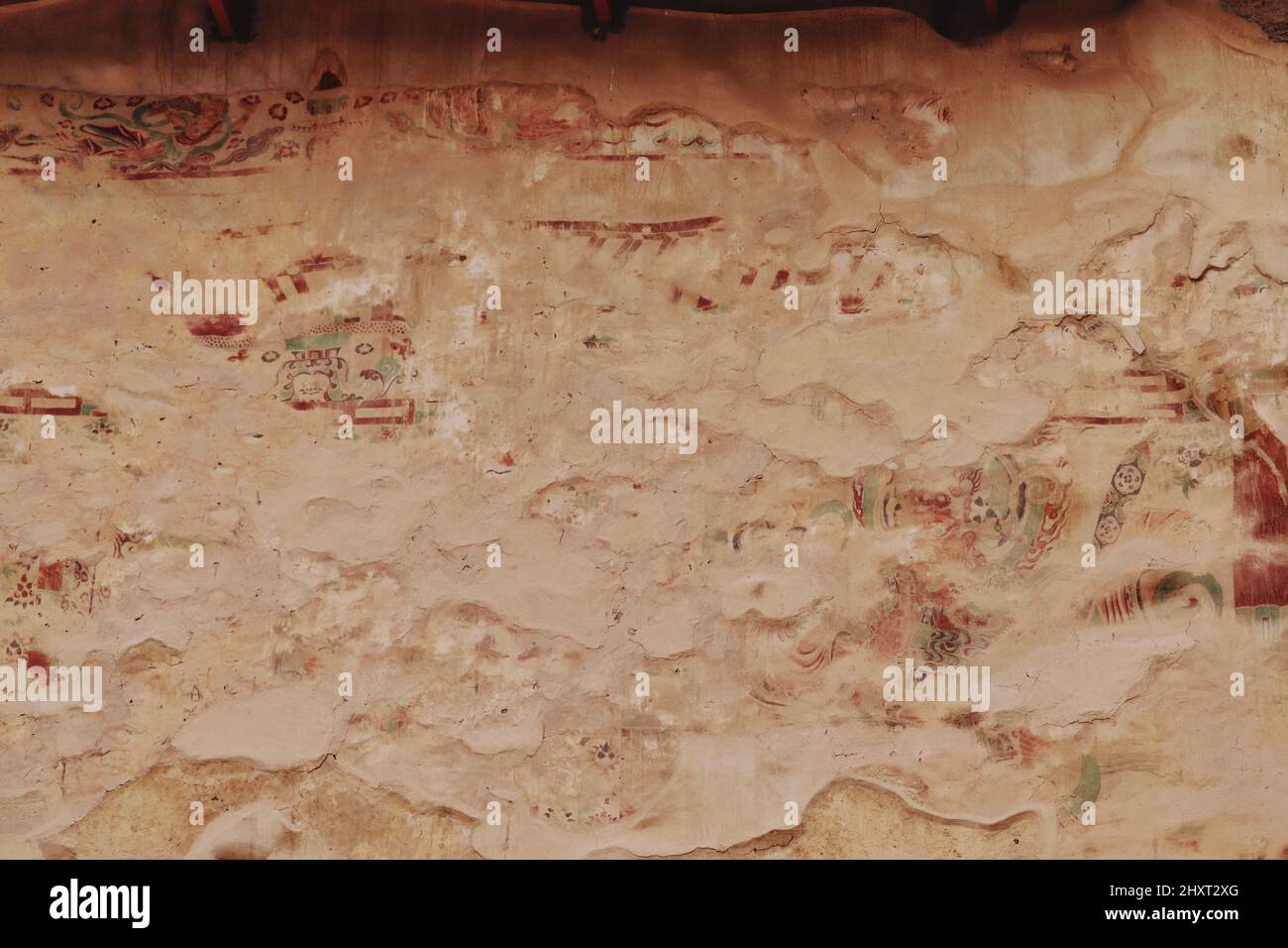 Closeup shot of cave paintings and petroglyphs in the Sahara desert ...