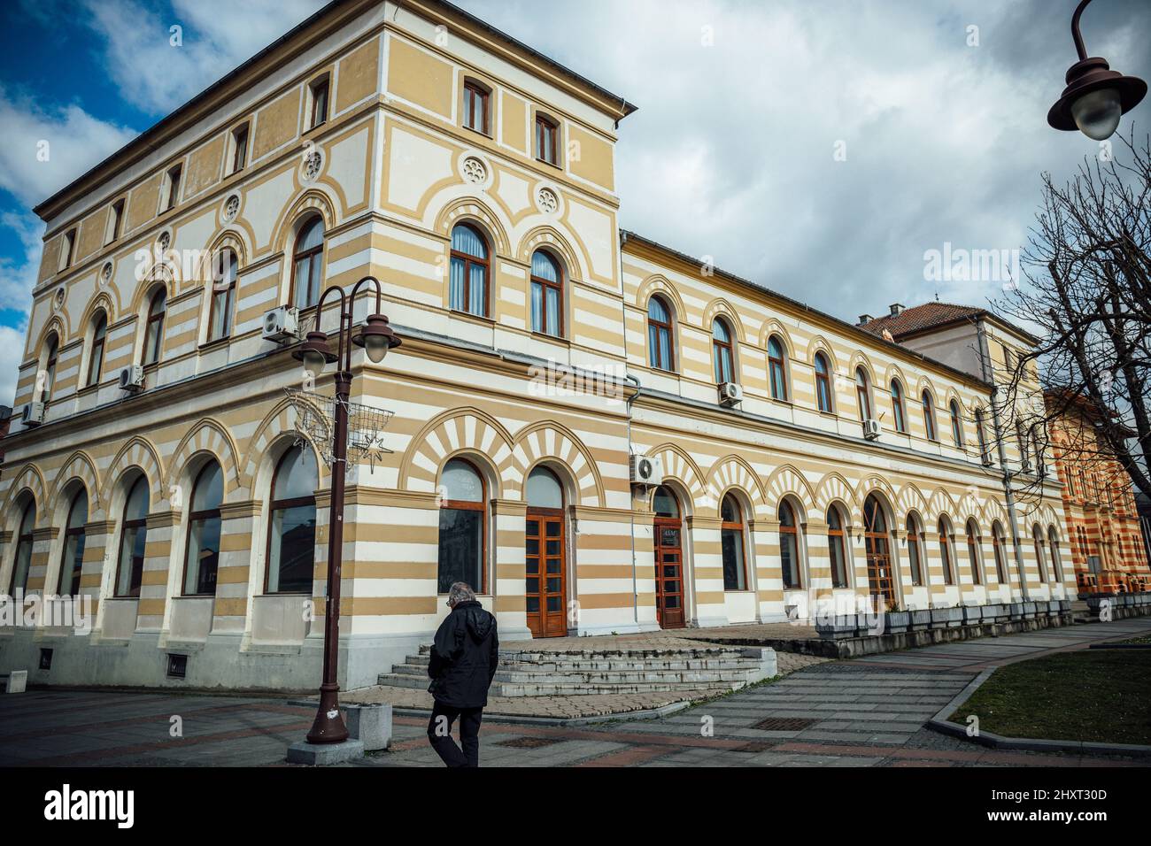 Beautiful view of vintage buildings in the small cite with a park near ...