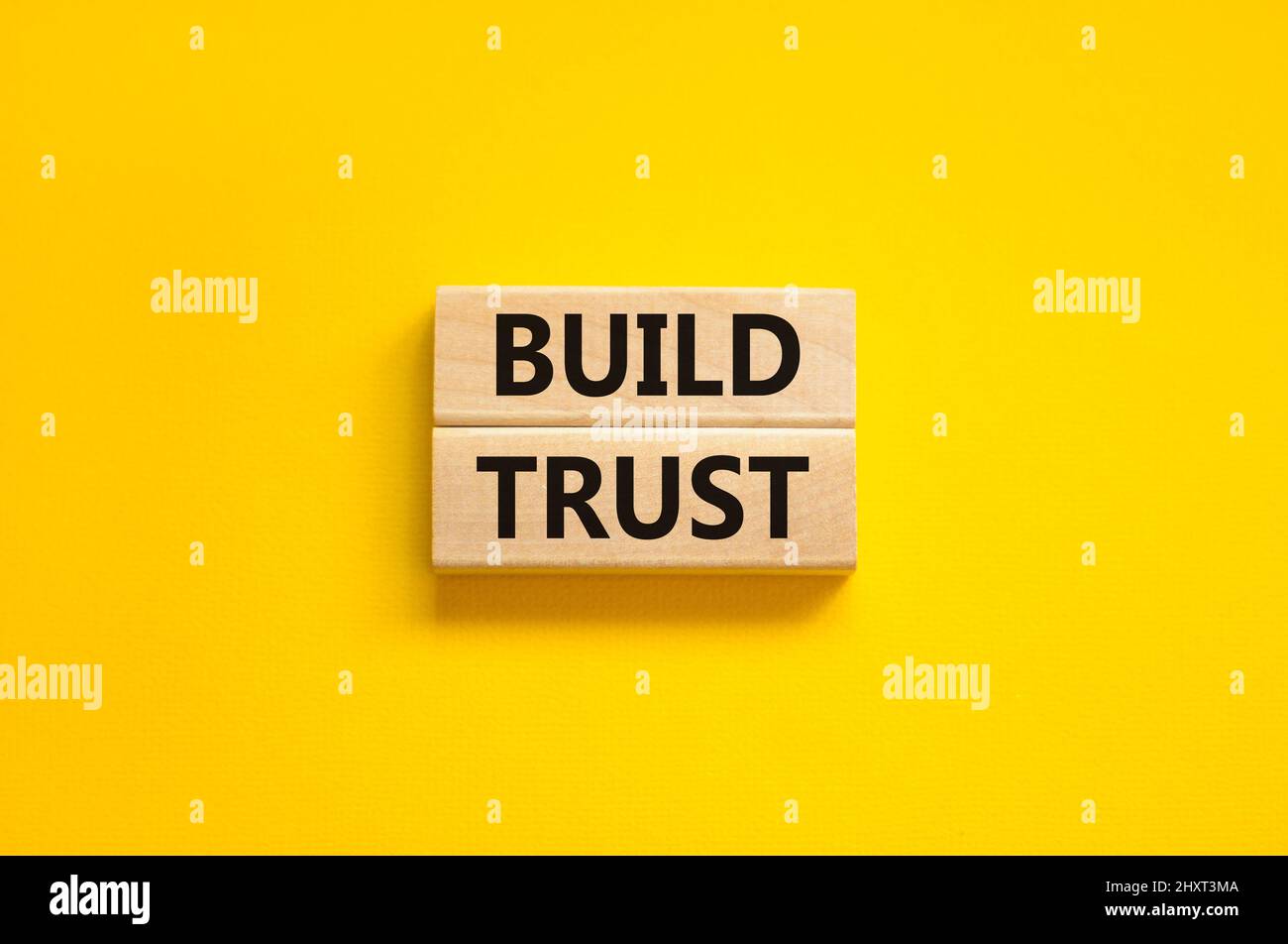 Build trust symbol. Concept words Build trust on wooden blocks on a ...
