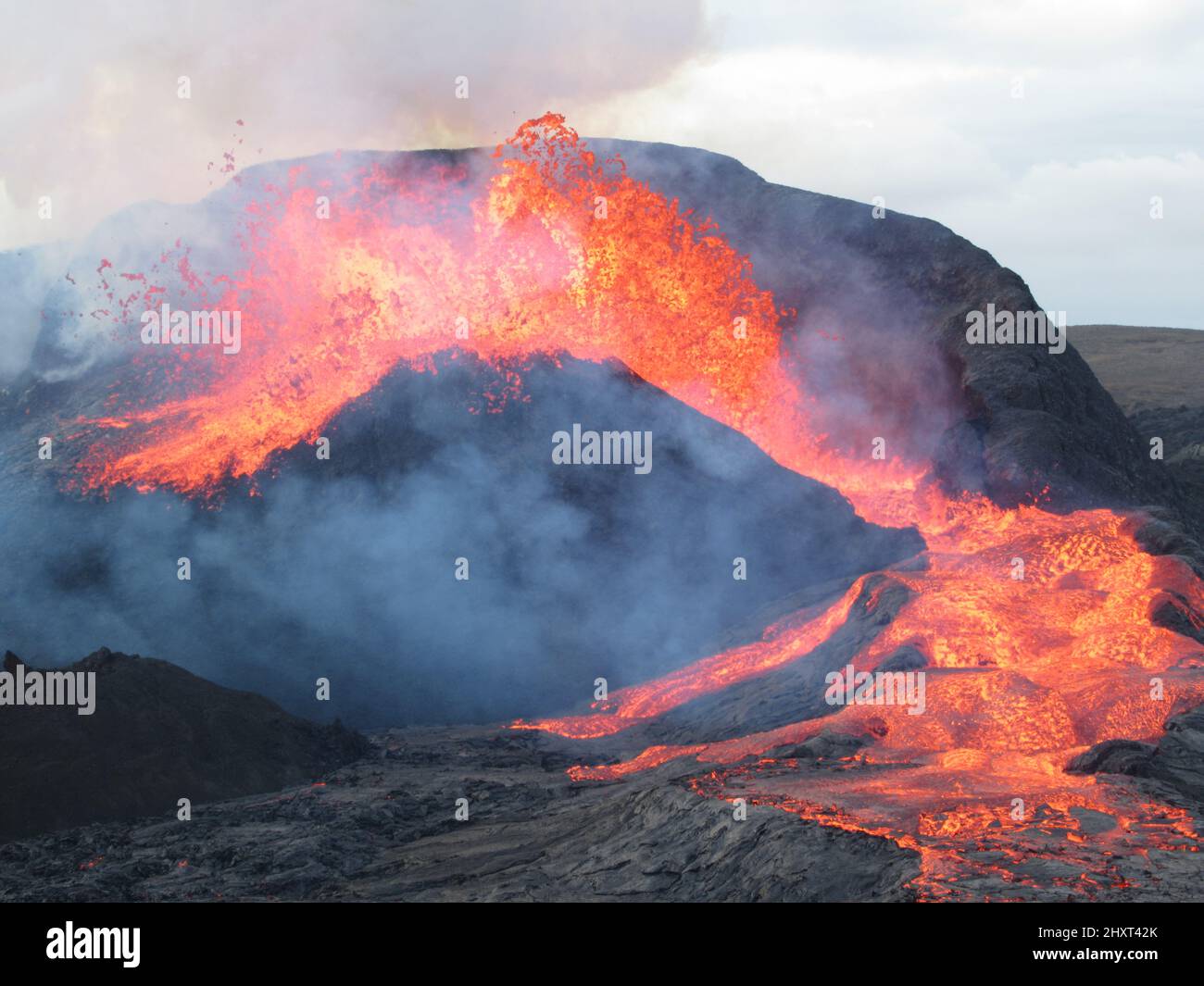 Shot of lava erupting at the volcano - Natural disaster Stock Photo - Alamy