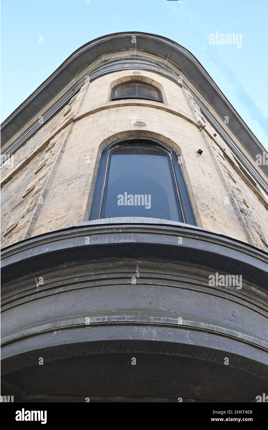 Low angle vertical shot of the curvy facade of a building in Galt ...