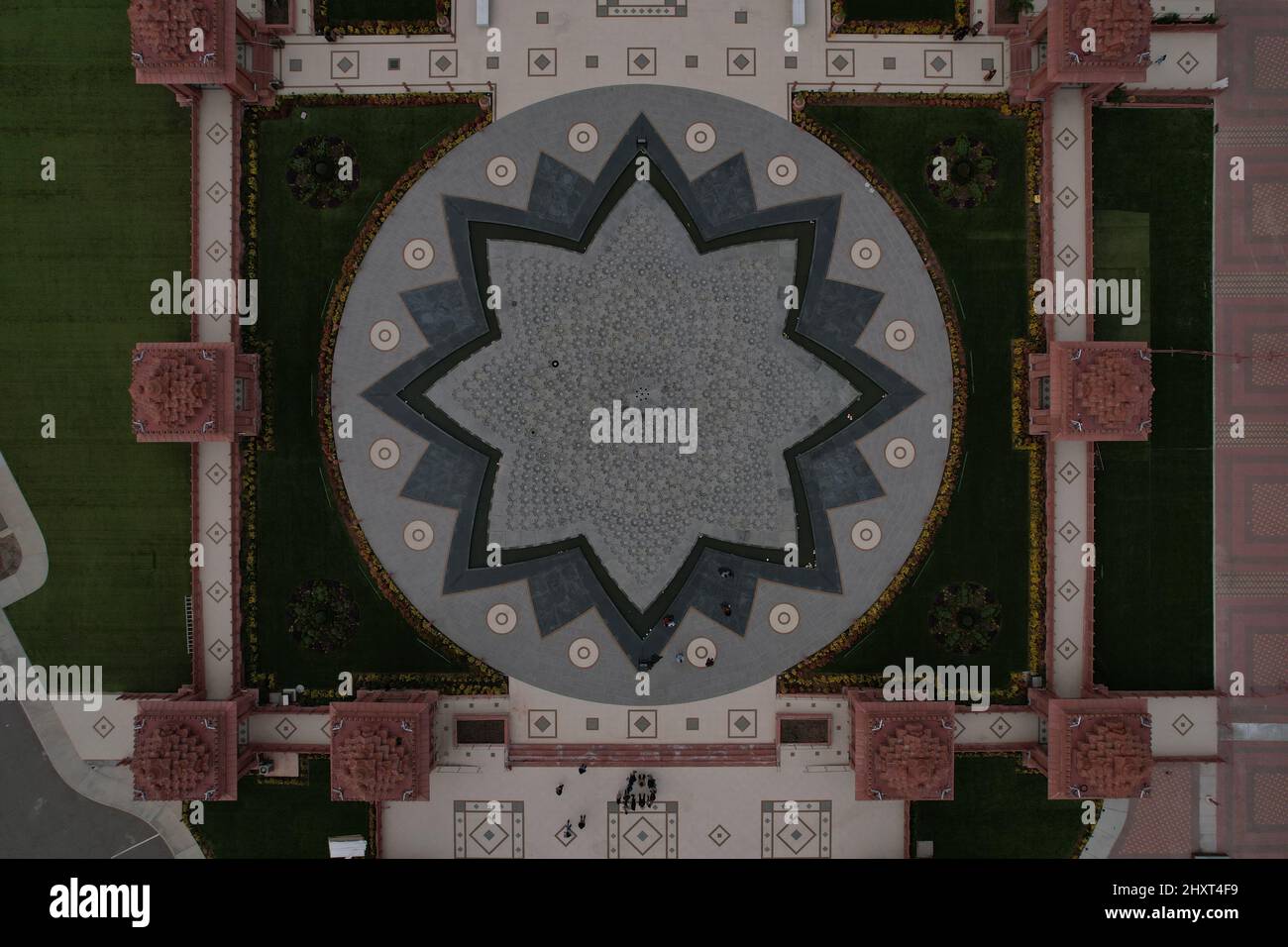 Aerial top view of a mandala-designed ground in a historical complex ...