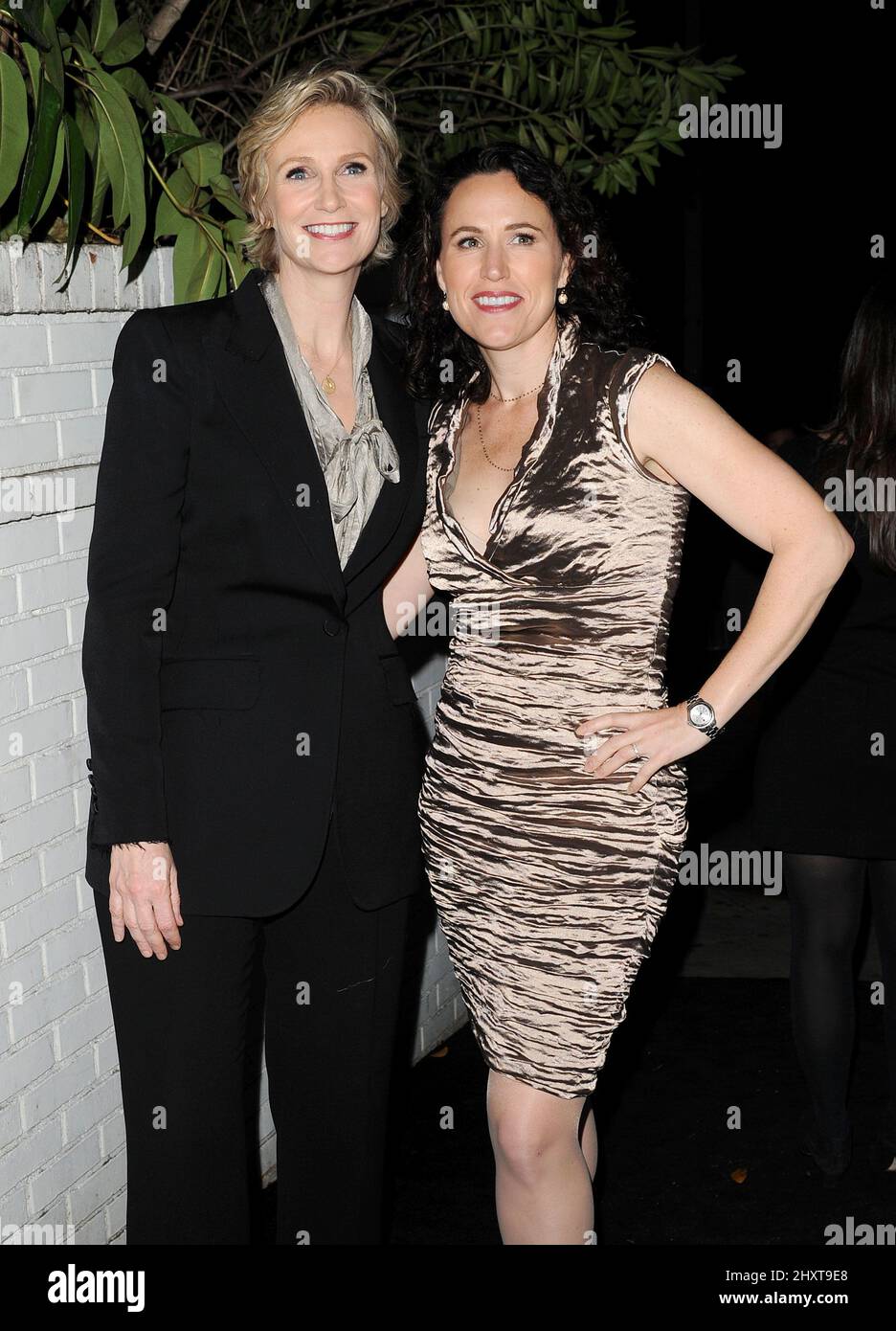 Jane Lynch and Lara Embry at EW's 2011 Pre Screen Actors Guild Awards ...